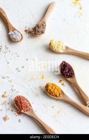 Overhead view of assorted wooden spoons and kitchen cooking utensils ...