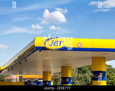 JET logo sign of a gas station. Symbol in the air in front of the blue ...