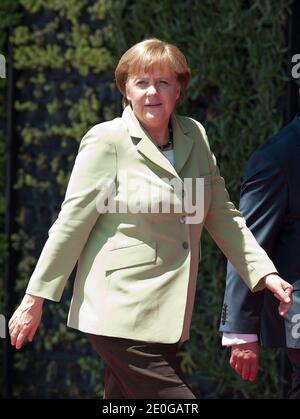 President of Mexico Felipe Calderon and German Chancellor Angela Merkel ...
