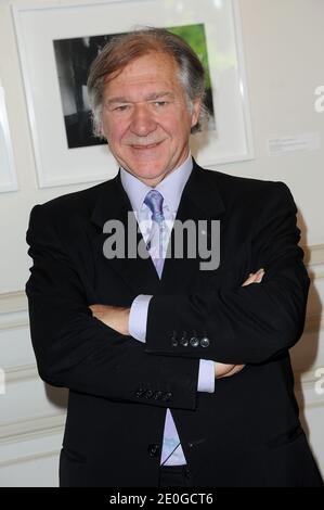 Pierre Santini posing during a medal ceremony held at the City Hall ...