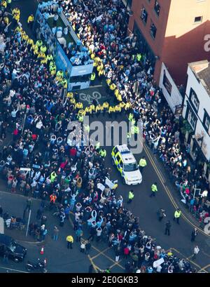 Fans line the streets during the open top bus parade through Leicester ...