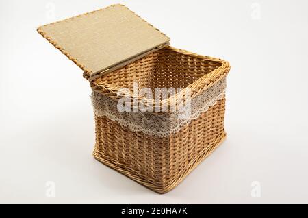 Weaver hand-made wicker chest with flowers, good job Stock Photo - Alamy
