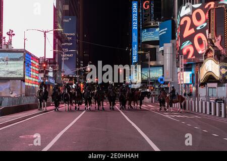 Revelers and police are seen during the Times Square New Year's Eve ...
