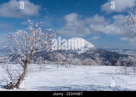 Mount Yotei, an active volcano on a sunny winter day in Niseko ...