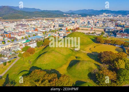 BUSAN, KOREA, OCTOBER 31, 2019: Aerial view of burial tombs in center ...