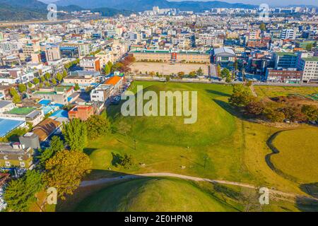 BUSAN, KOREA, OCTOBER 31, 2019: Aerial view of burial tombs in center ...