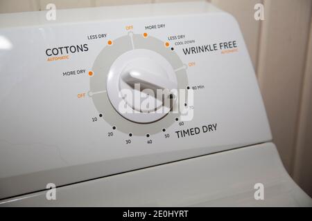 Dials on a dryer set to 70 minutes in timed dry Stock Photo - Alamy