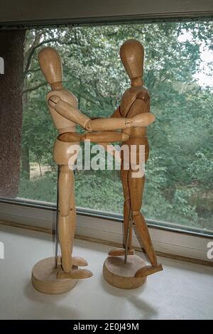 Two male dolls hugging Stock Photo - Alamy