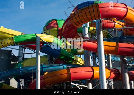 Colourful slide tubes at Waterworld water park, Stoke-on-Trent, UK ...