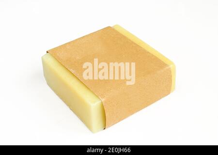 Natural homemade soap wrapped in handmade pressed flower paper lie in a ...