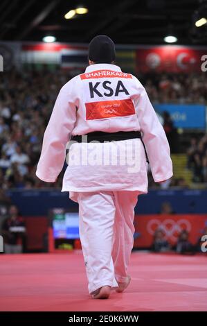Veiled Judoka Wojdan Shaherkani of Saudi Arabia fights against Melissa ...