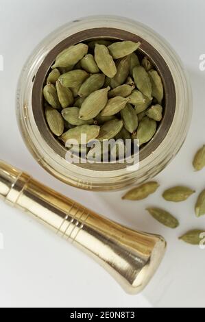 Indian spices-Cardamom small size on white background Stock Photo - Alamy