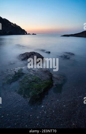 Sunset at Hele Bay, Devon, UK Stock Photo - Alamy