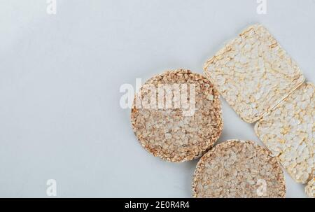 Two types of crispbread on white background Stock Photo - Alamy