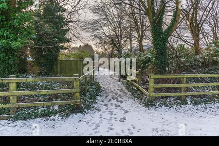 Snow covered alleyway providing access to housing estate at Woolston in ...