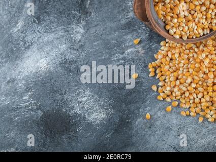 An ancient bowl full of uncooked popcorn seeds Stock Photo - Alamy