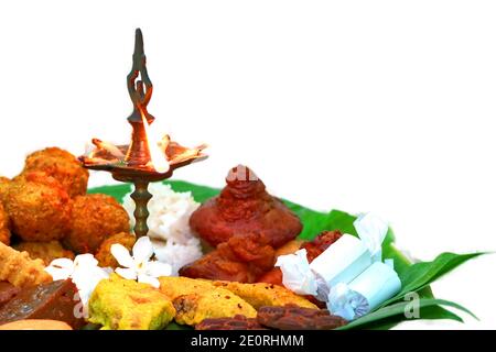 Sinhala and Tamil New Year celebration table with traditional sweets ...