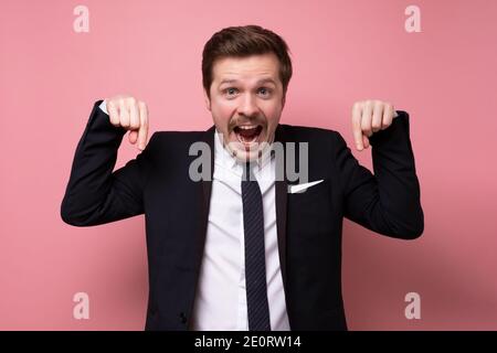 amazed businesspeople of guy pointing finger on man talking on phone ...