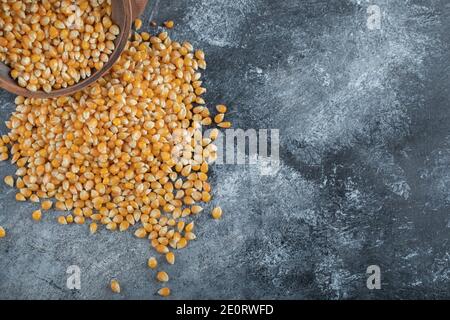 An ancient bowl full of uncooked popcorn seeds Stock Photo - Alamy