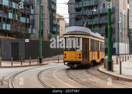 Yellow urban tram runs along the city tracks, street photography Stock ...
