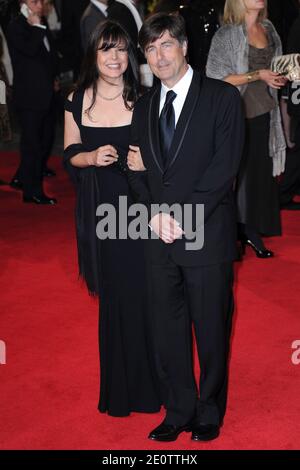 Writer Neal Purvis and guest attending the latest James Bond Skyfall ...