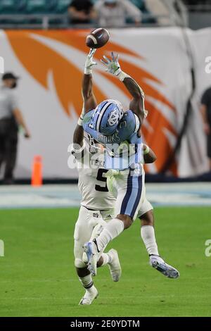 North Carolina running back British Brooks (24) runs away from Georgia ...