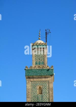 The vintage minaret in Fez city, Morocco Stock Photo - Alamy