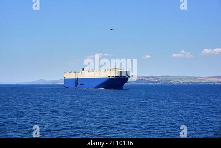 Big cargo ship crossing the strait Stock Photo - Alamy