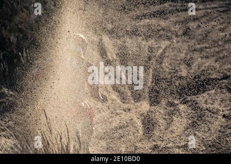 Enduro motorcycle racing in mud and sand Stock Photo - Alamy