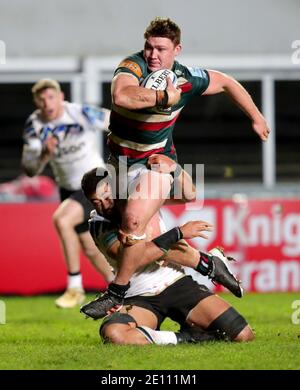 Leicester Tiger's Jasper Wiese is tackled by Newcastle Falcon's Michael ...