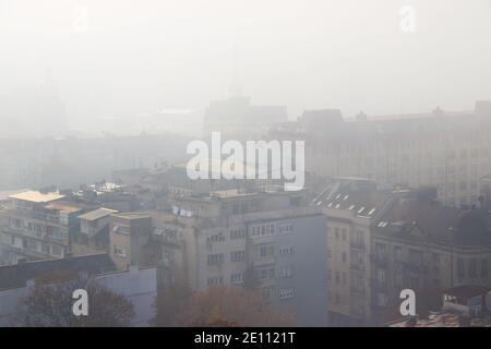 City pollution mixed with morning fog, Belgrade cityscape, save the ...