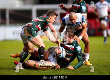 Bath Rugby's Ben Spencer (centre) lifts the trophy with team-mates ...