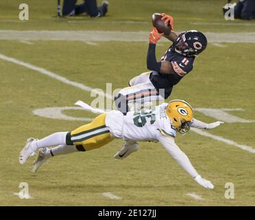 Chicago Bears wide receiver Darnell Mooney (11) runs with the ball ...