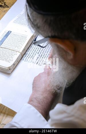 Orthodox Jew writing a Torah scroll, sculpture at the Diaspora Museum ...