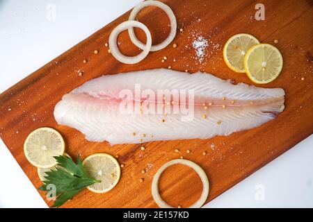 fresh fillet dory fish on wooden tray Stock Photo - Alamy