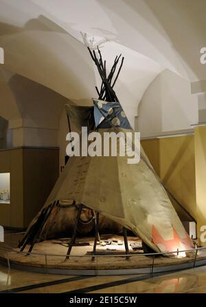 Tipi (tepee). Conical tent made of animal skins upon wooden poles. Used ...