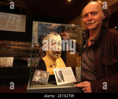 Museum founder Dan Ohlman poses with a Gremlin puppet from the film ...