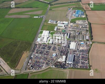 Aerial view of Full Sutton industrial estate, airfield and prison. Near ...