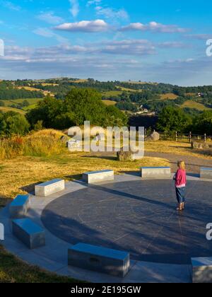 Woman admiring view from Stoney Wood Star Disc in Wirksworth Derbyshire ...