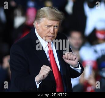 President Donald Trump dances after speaking at a campaign rally at ...