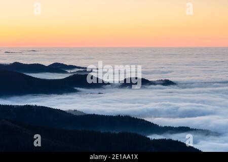 Ridges of Mala Fatra mountain range shrouded in low clouds, Slovakia ...