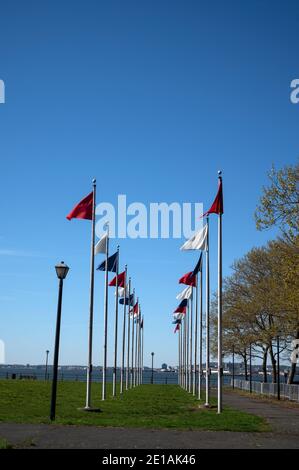 Flag poles and flags in park around Lake Eola in downtown Orlando ...