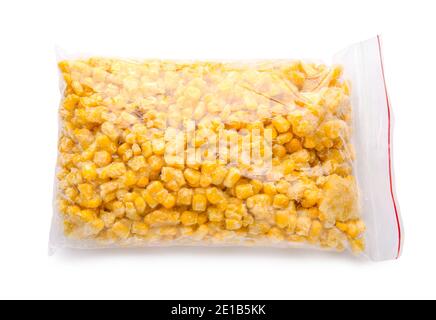Frozen corn in plastic bag isolated on white. Vegetable preservation ...