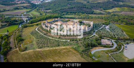 View of the medieval town of Monteriggioni from the surrounding fields ...