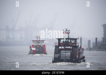 Hamburg, Germany. 06th Jan, 2021. Several HADAG ferries are sailing in ...
