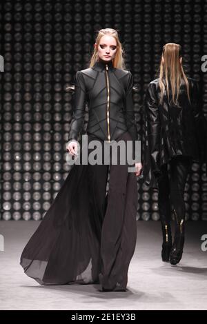 A model displays a creation designed by British Designer Gareth Pugh ...