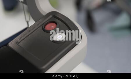 Robotic surgery. Control console for a Da Vinci robot surgeon. This ...