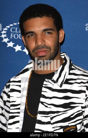 Drake arriving for President Clinton Hosts Millennium Network Event ...