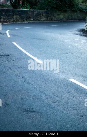 A narrow road with a sharp bend on the way to Lee Bay, Ilfracombe ...