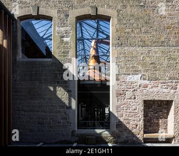 Exterior view of The Borders Distillery, Hawick, Scotland, UK at night ...